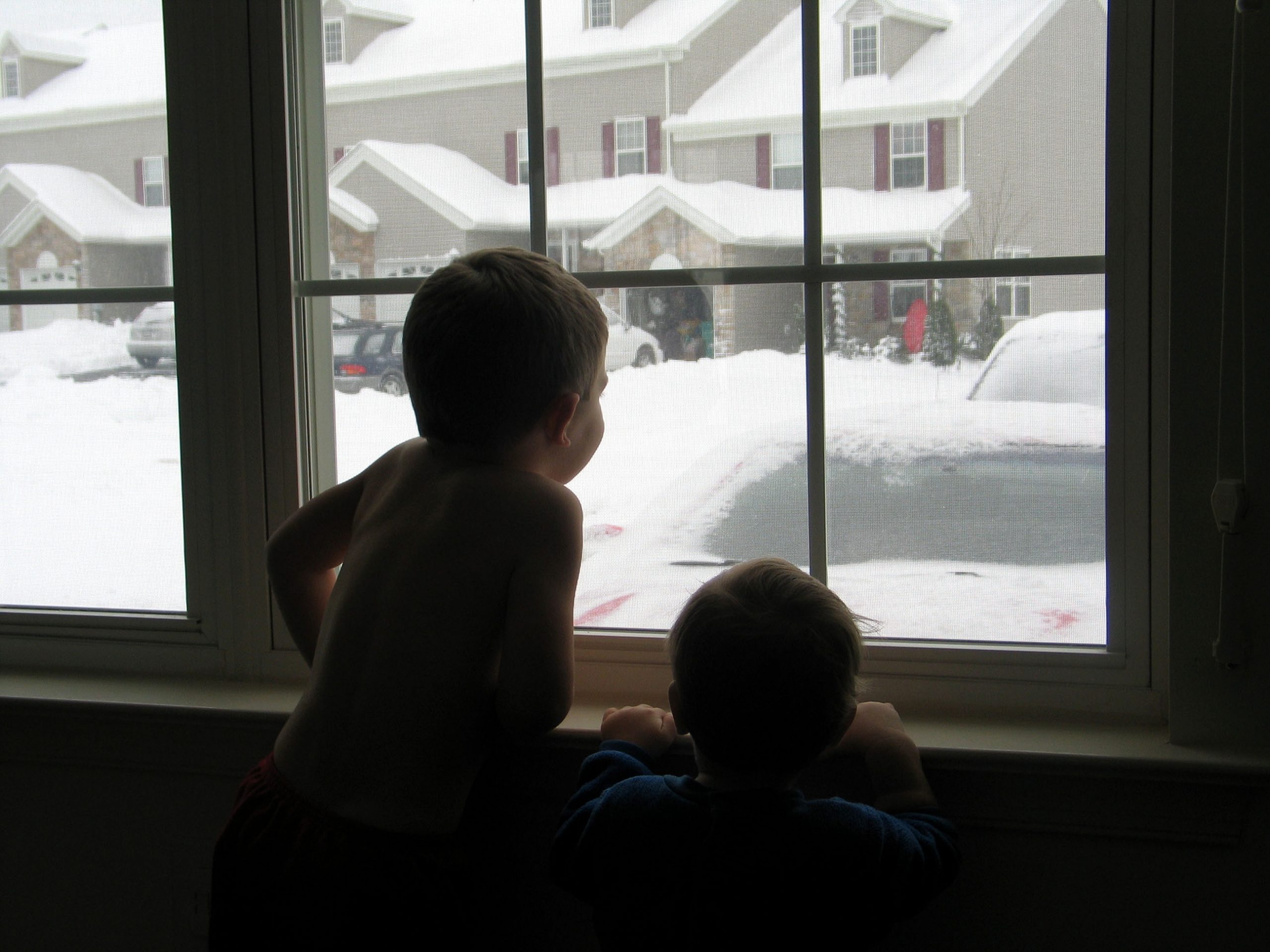 Looking Through A Window At Snow